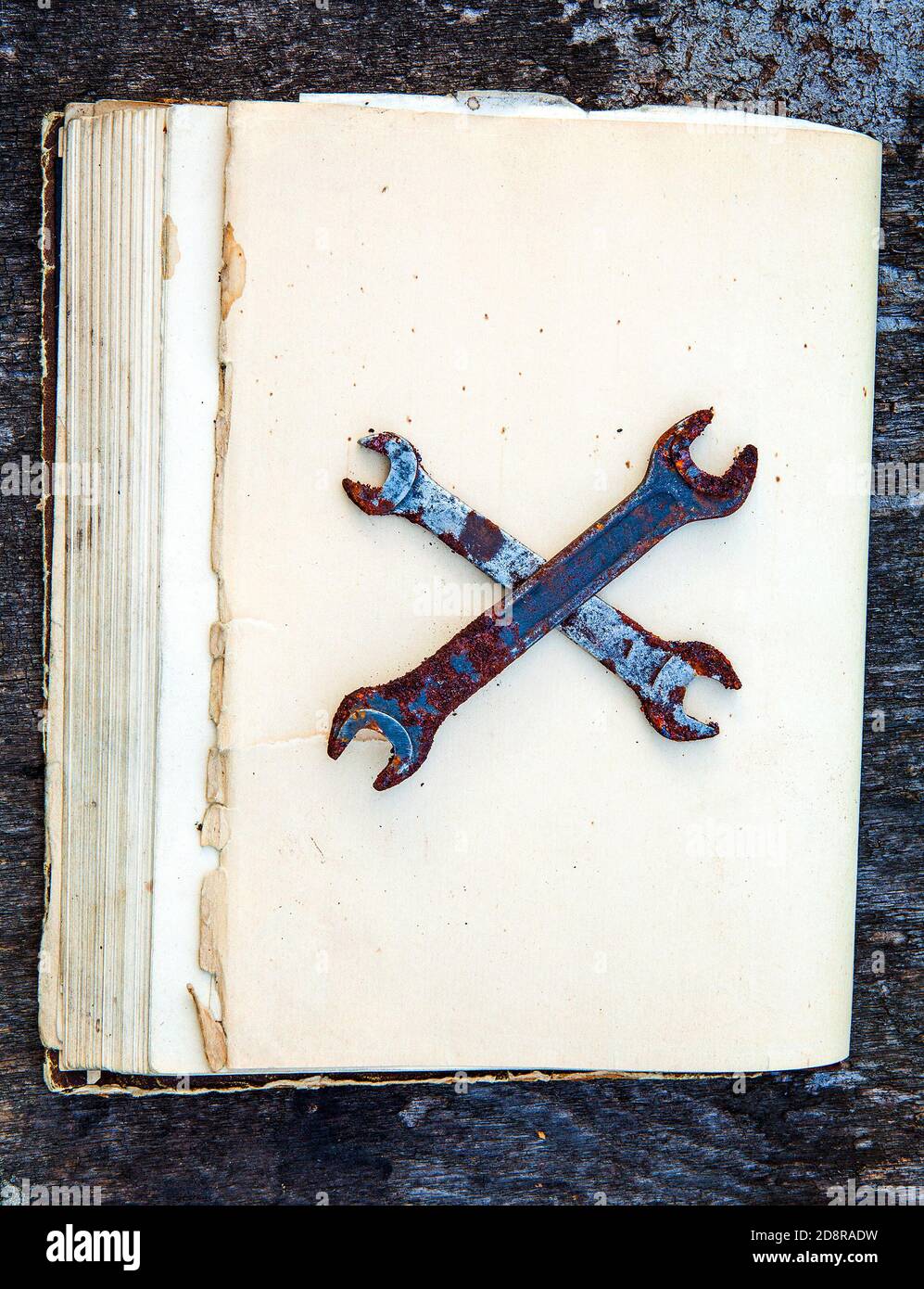 Old Rusty Tools on the Old Book and Wooden Background closeup Stock ...
