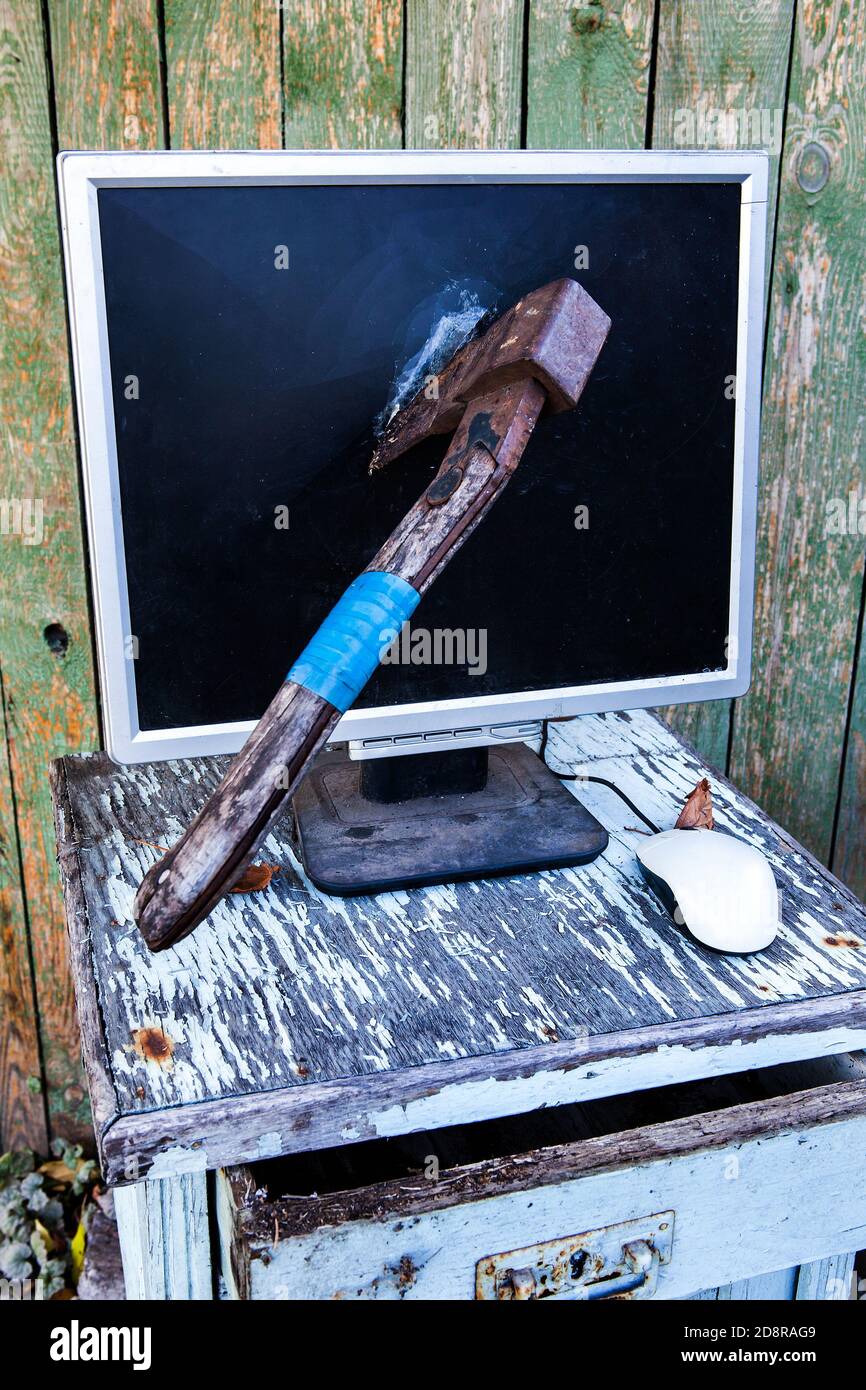 Axe to Smash a Computer Screen on the Old Planks Background Stock Photo ...