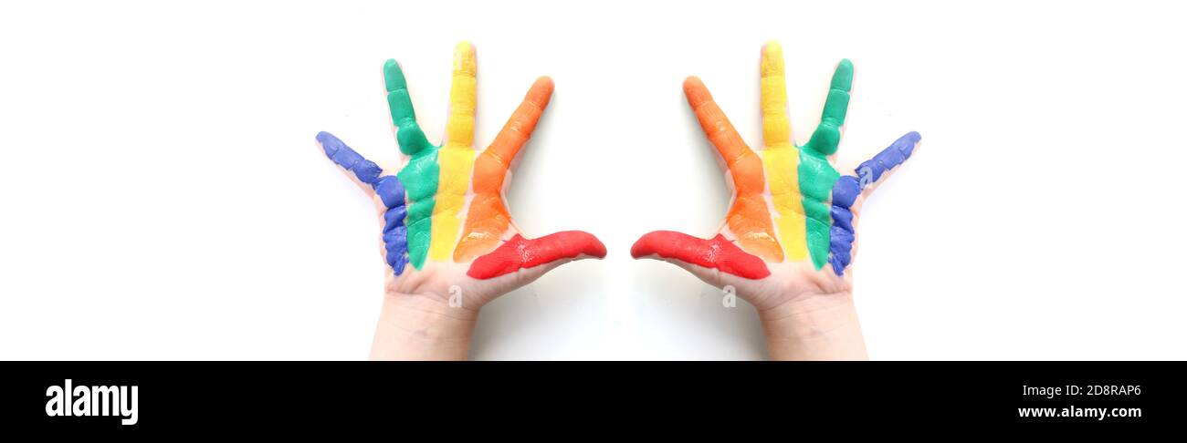 Rainbow painted hand shape isolated on white. Hand painted rainbow ...