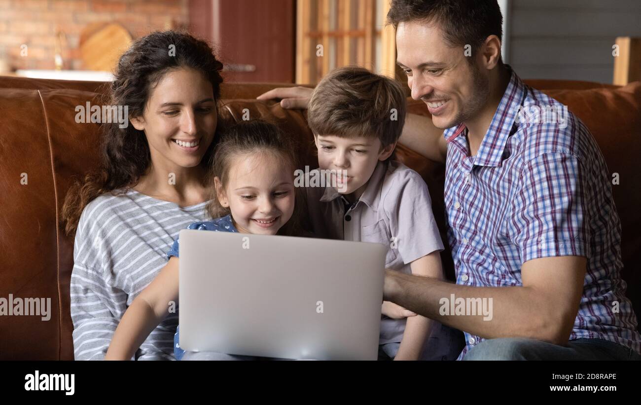 Parents look at laptop screen hi-res stock photography and images - Alamy