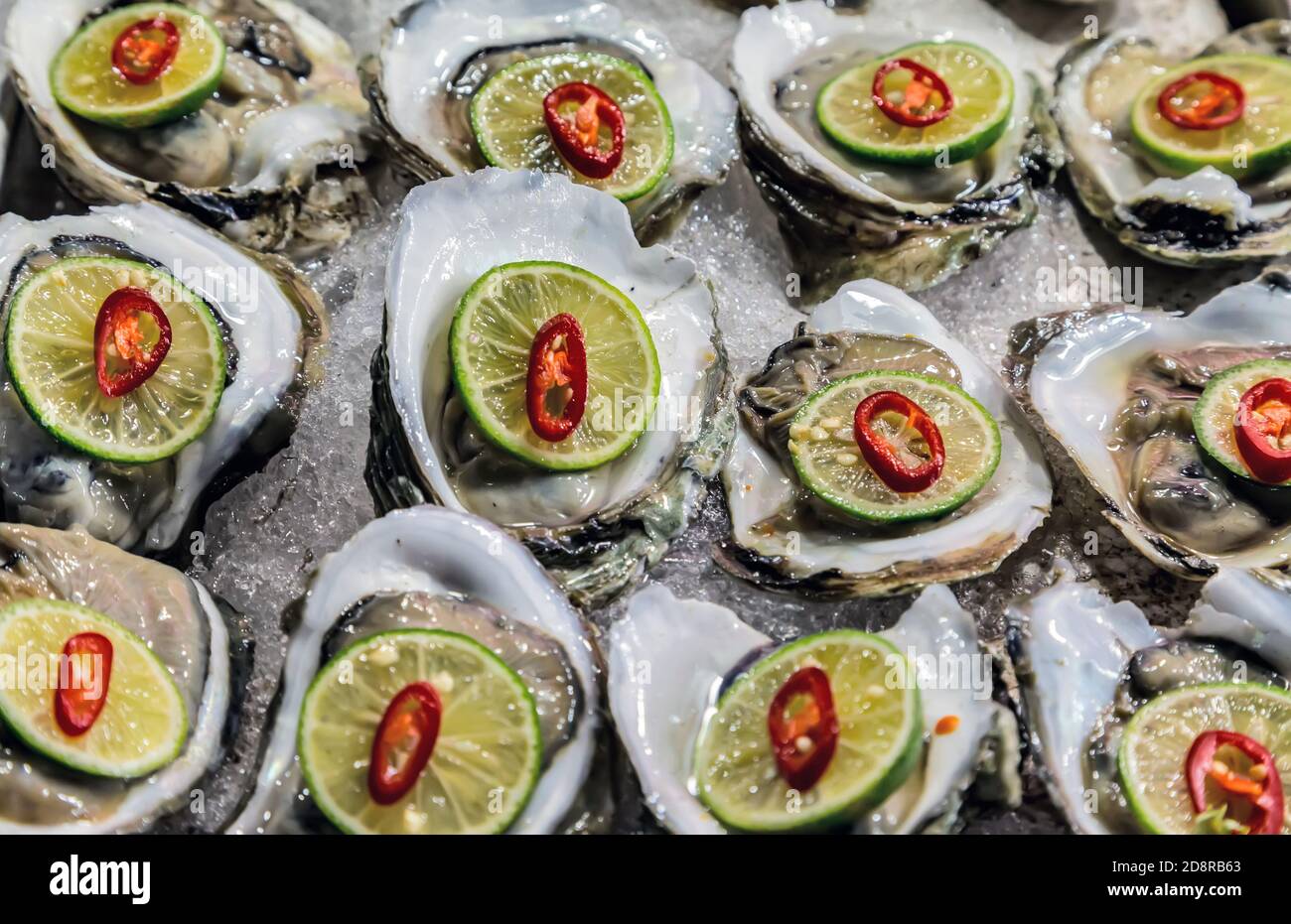 Grilled Scallops On the Half Shell Stock Photo - Alamy