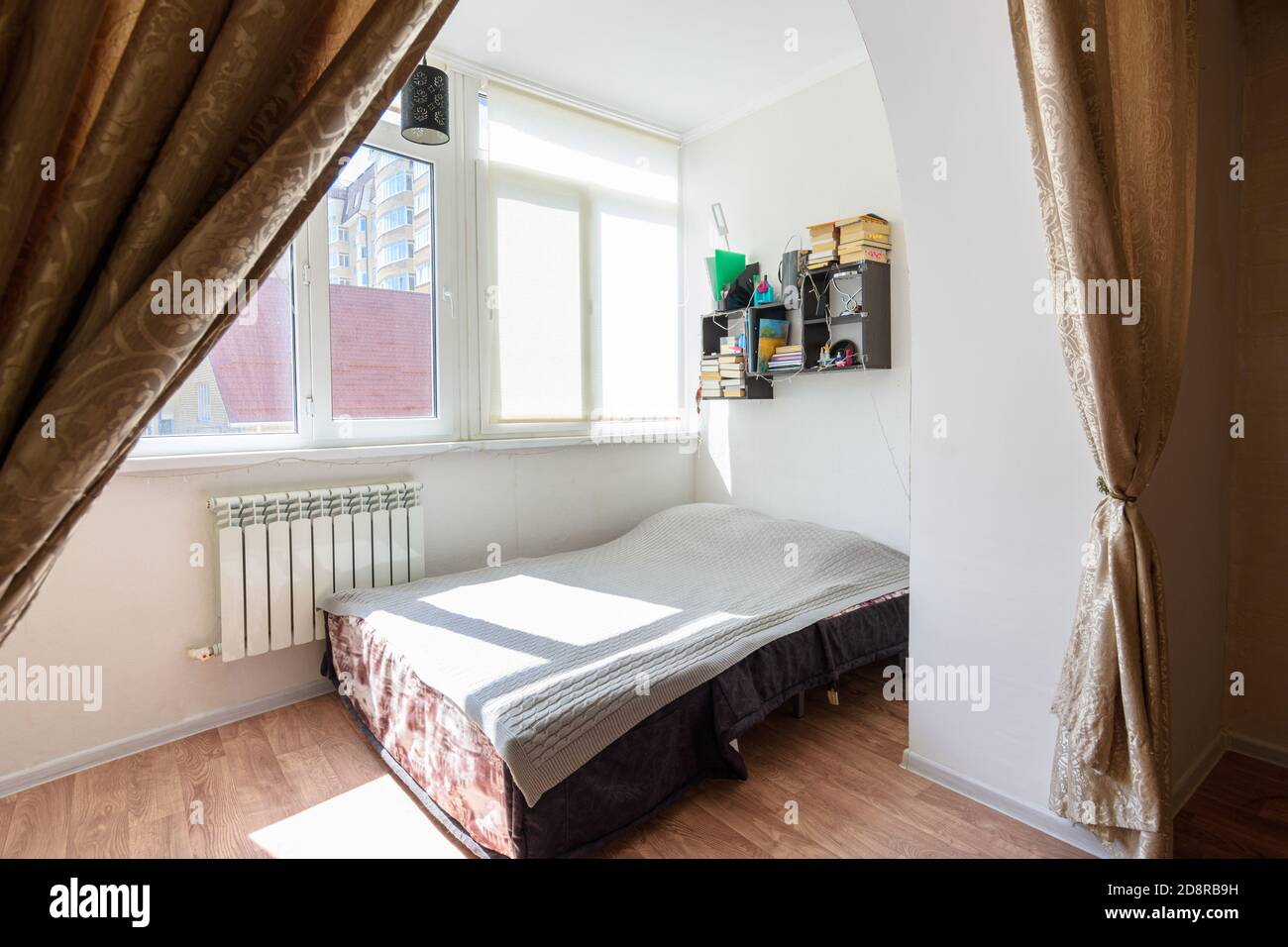 The interior of a spacious loggia in an apartment building on which a ...