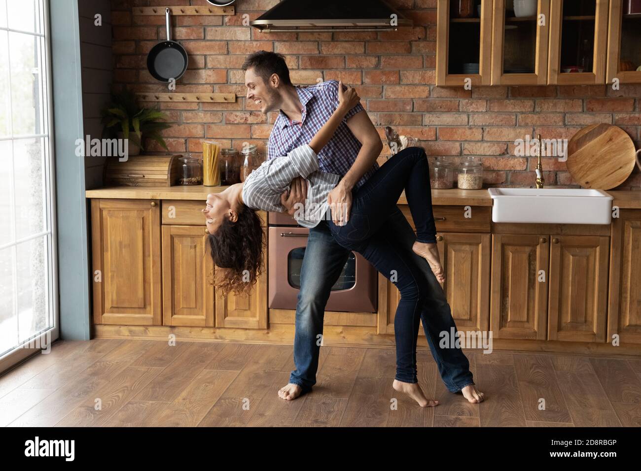 Overjoyed couple celebrate good hi-res stock photography and images - Alamy