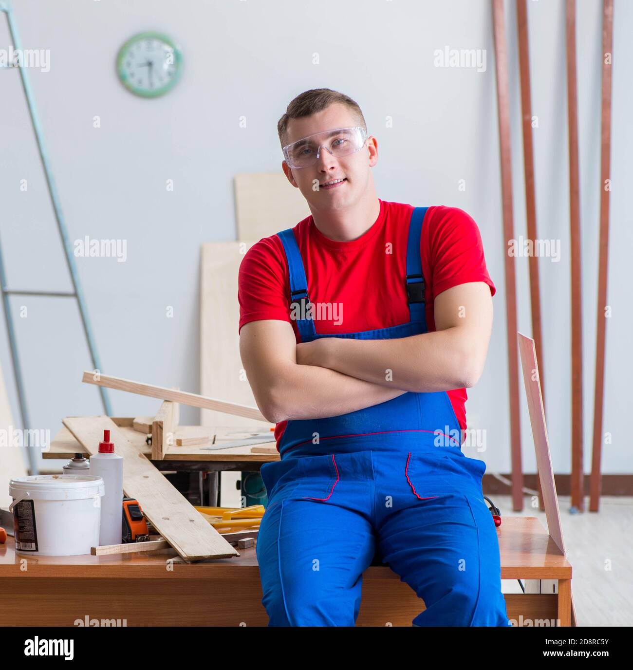 The contractor working in the workshop Stock Photo - Alamy