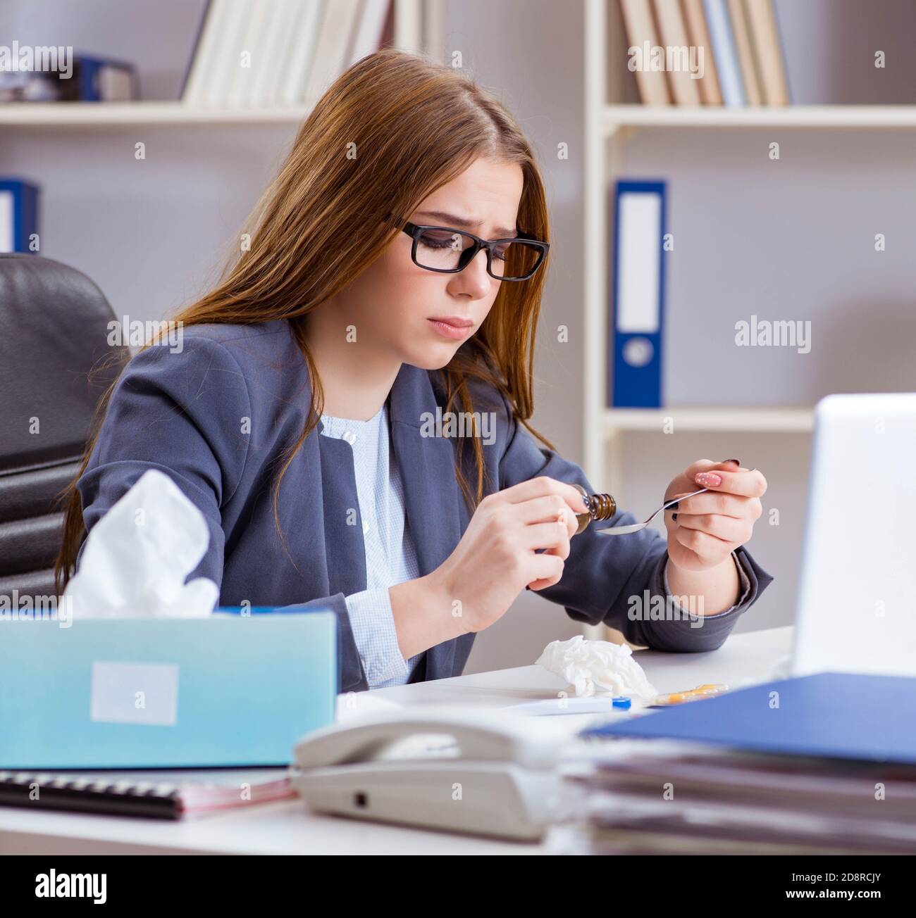 The businesswoman employee sick in the office Stock Photo - Alamy