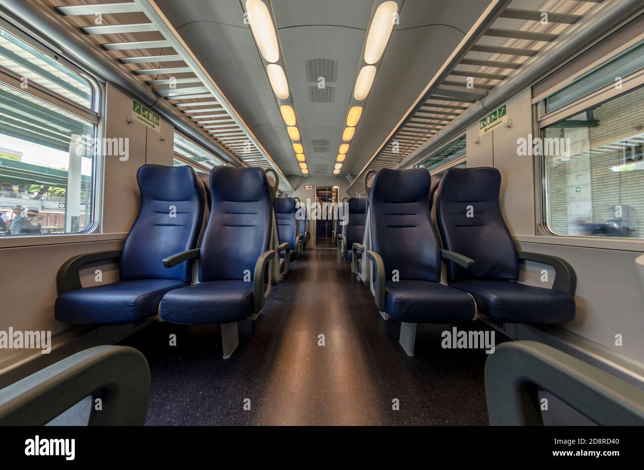 View of the interior of a train with empty seats Stock Photo - Alamy