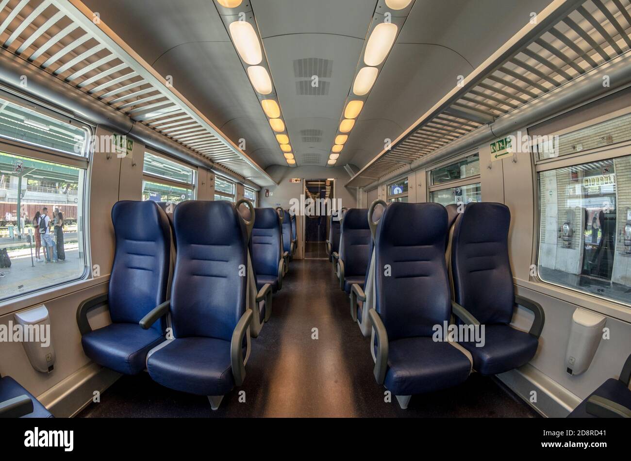 View of the interior of a train with empty seats Stock Photo - Alamy
