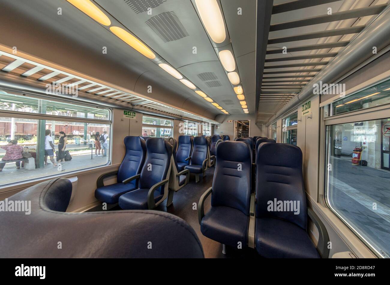 View of the interior of a train with empty seats Stock Photo - Alamy