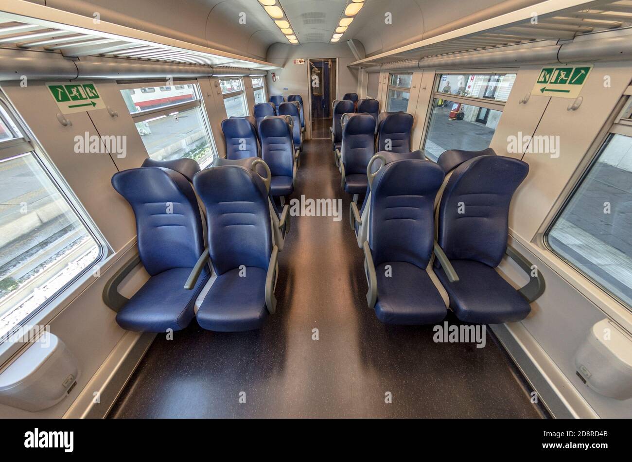 View of the interior of a train with empty seats Stock Photo - Alamy