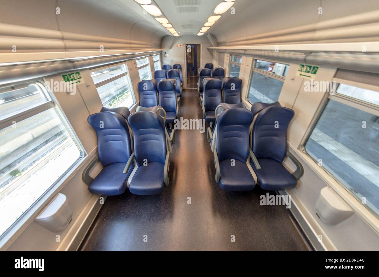 View of the interior of a train with empty seats Stock Photo - Alamy