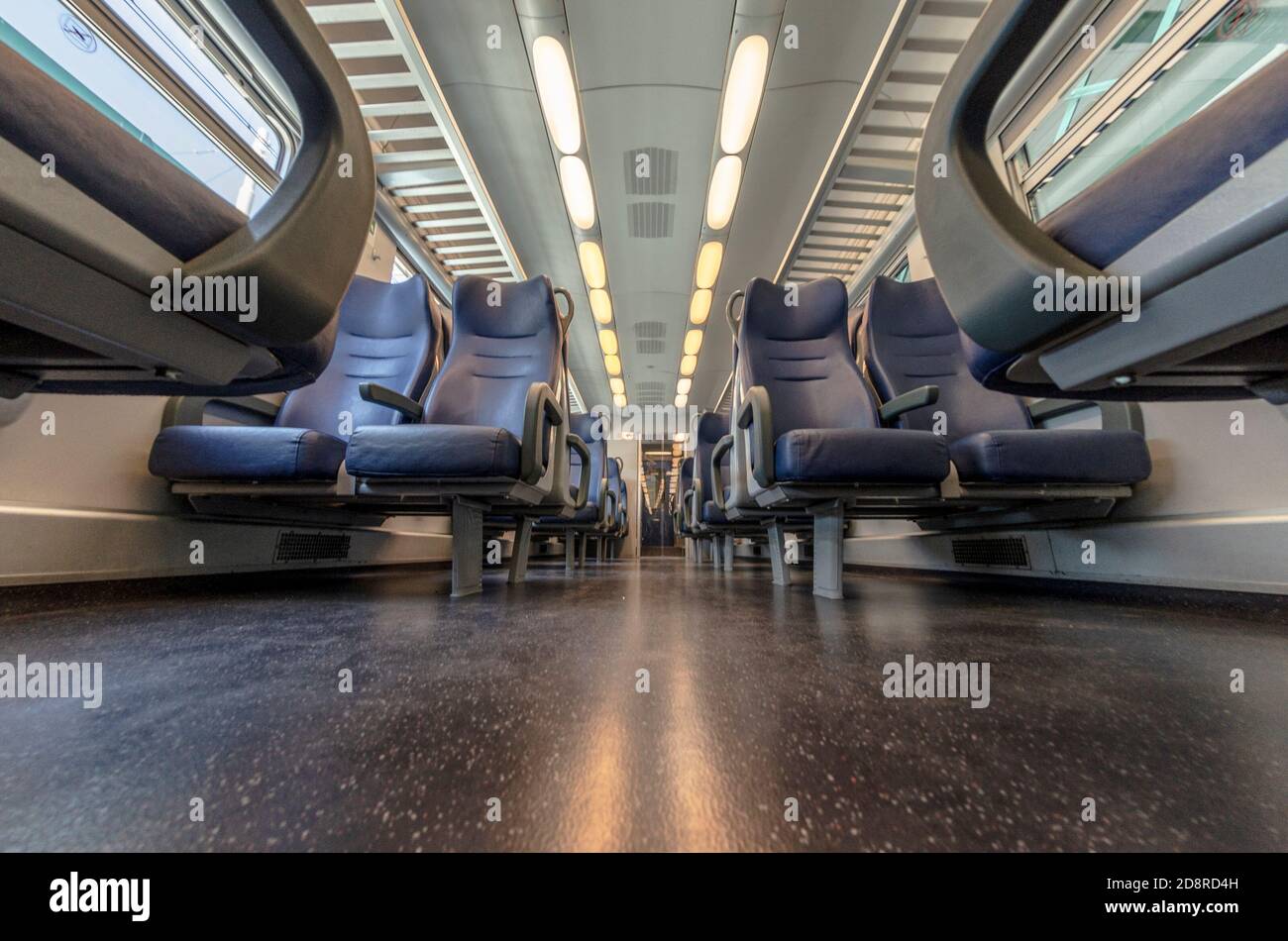 View of the interior of a train with empty seats Stock Photo - Alamy
