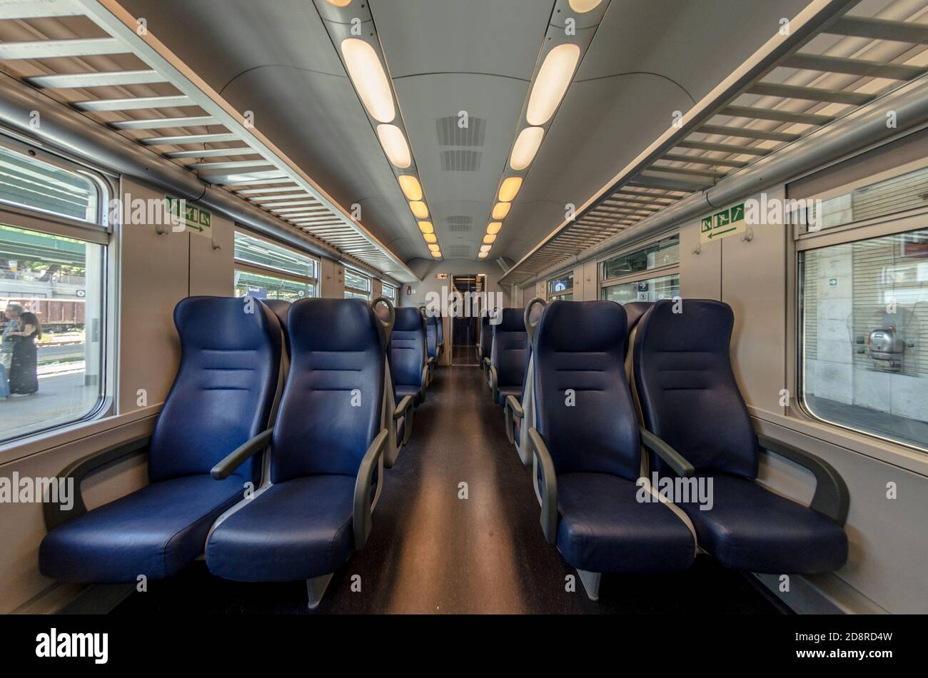 View of the interior of a train with empty seats Stock Photo - Alamy