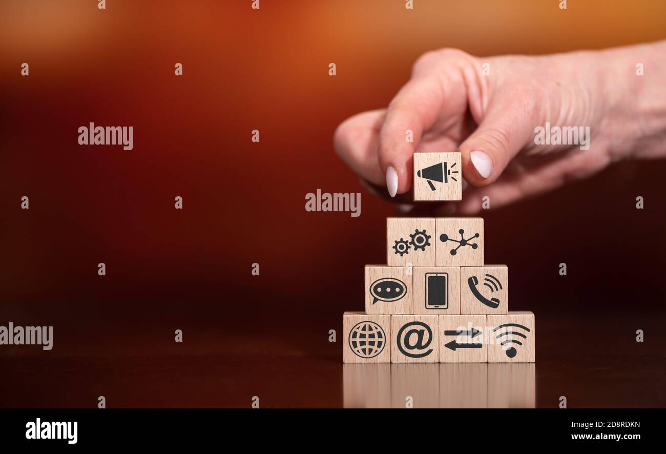 Concept of communication on wooden cubes Stock Photo - Alamy