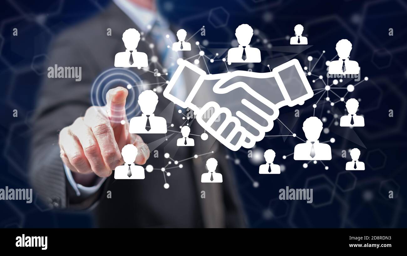 Man touching a partnership concept on a touch screen with his fingers ...