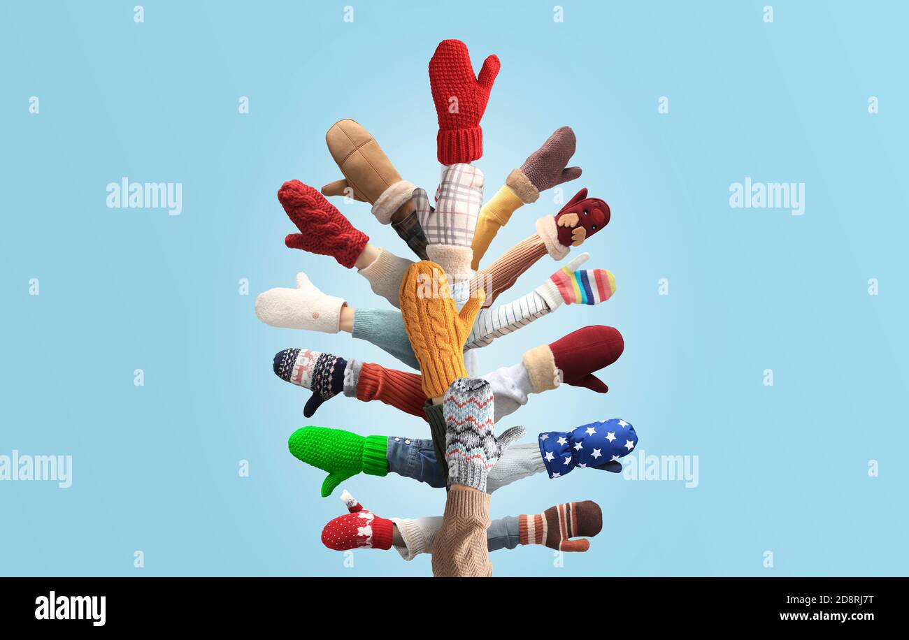 Christmas tree made up of hands with mittens. Winter Christmas concept ...
