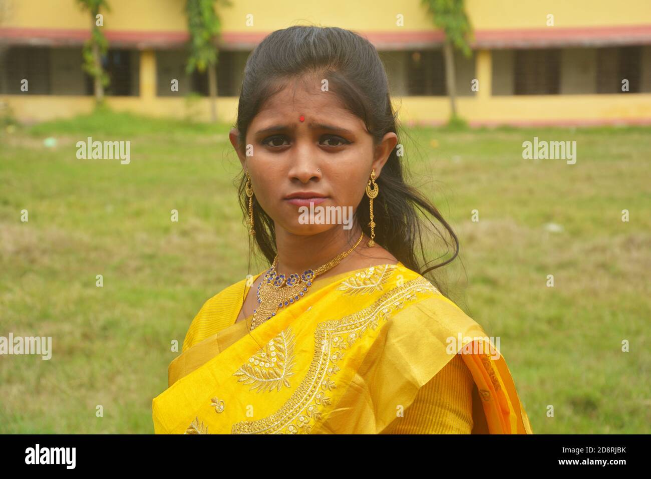 Yellow saree hi-res stock photography and images - Alamy
