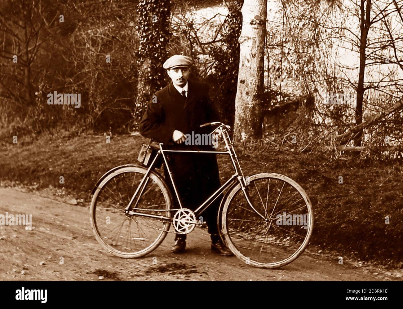 Proud cyclist with his bicycle, early 1900s Stock Photo - Alamy