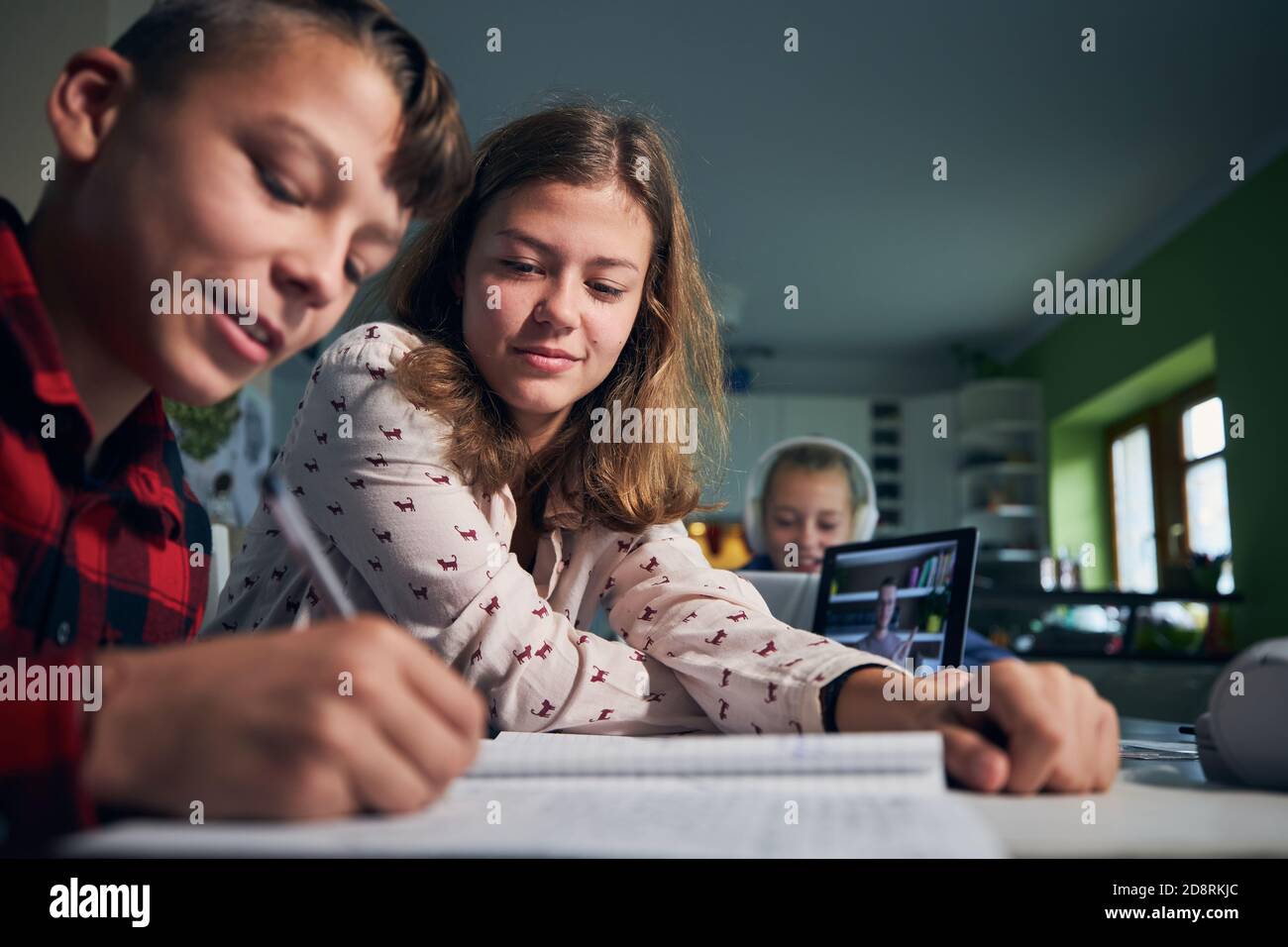 Online school lesson. Children learning via internet with laptops at ...