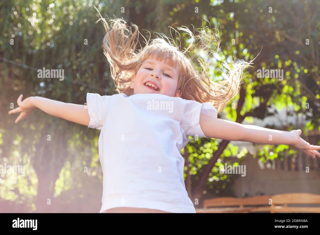 Happy Little Girl Jumping