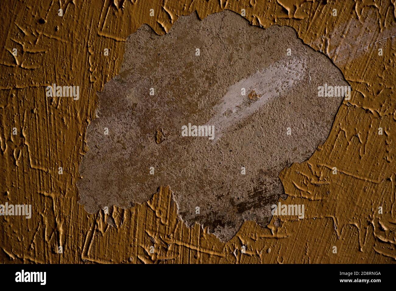 Abstract painted of rotten wall in orange or mustard color in Prague ...