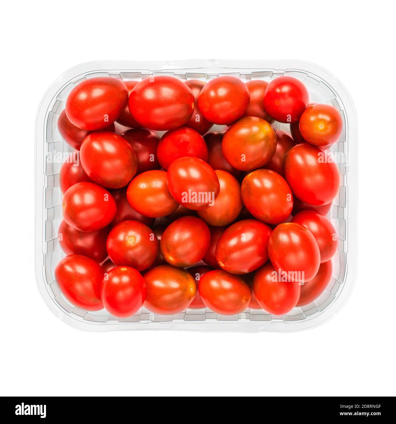 Fresh cherry tomatoes in a plastic box isolated on white background ...