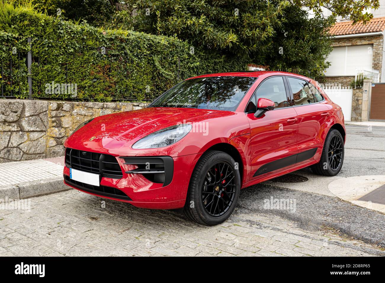 Galicia, Spain. October 30 2020: Red Porsche Cayenne GTS car on street ...