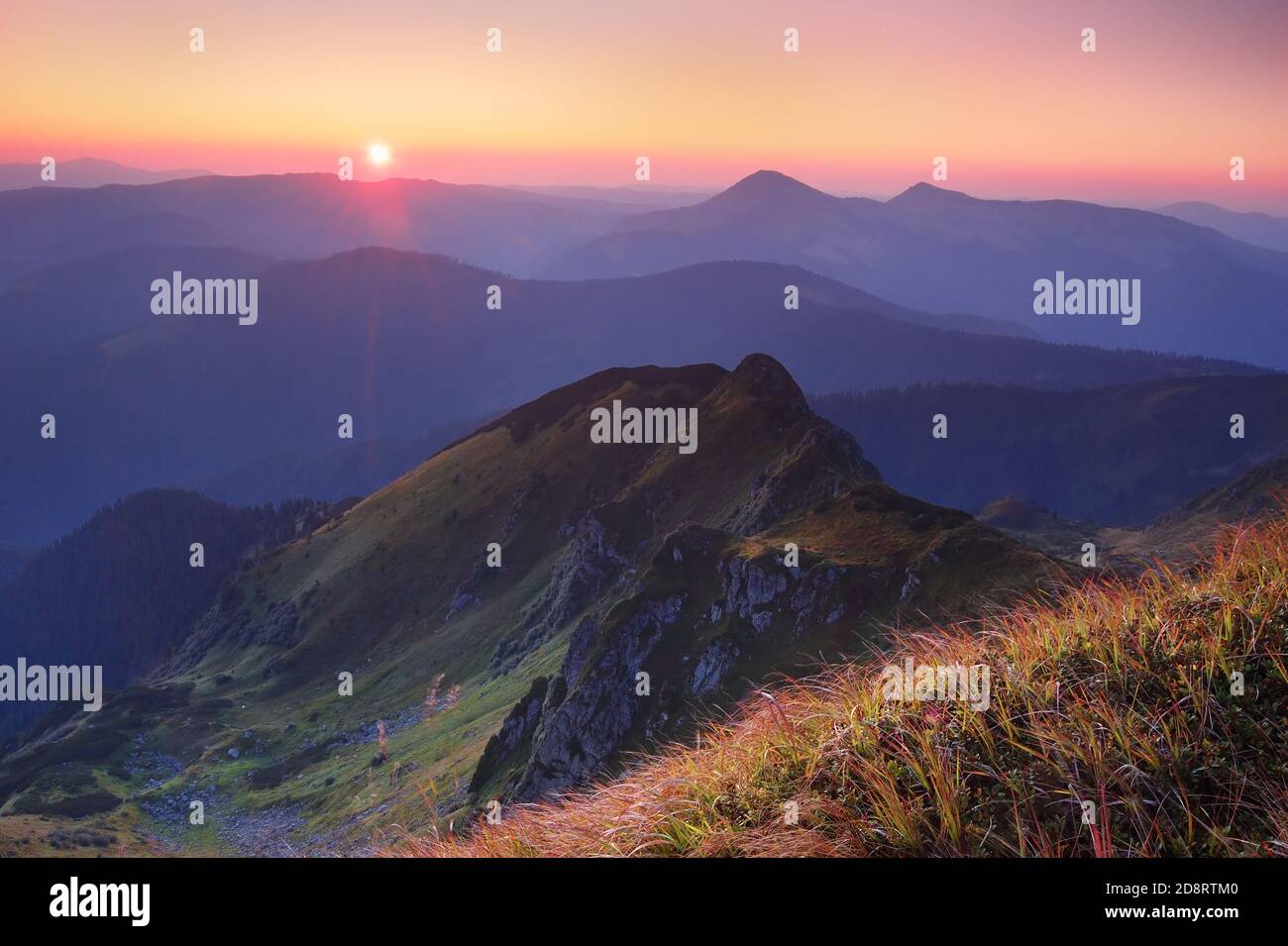 Mountain landscape in the morning with the rising sun Stock Photo - Alamy