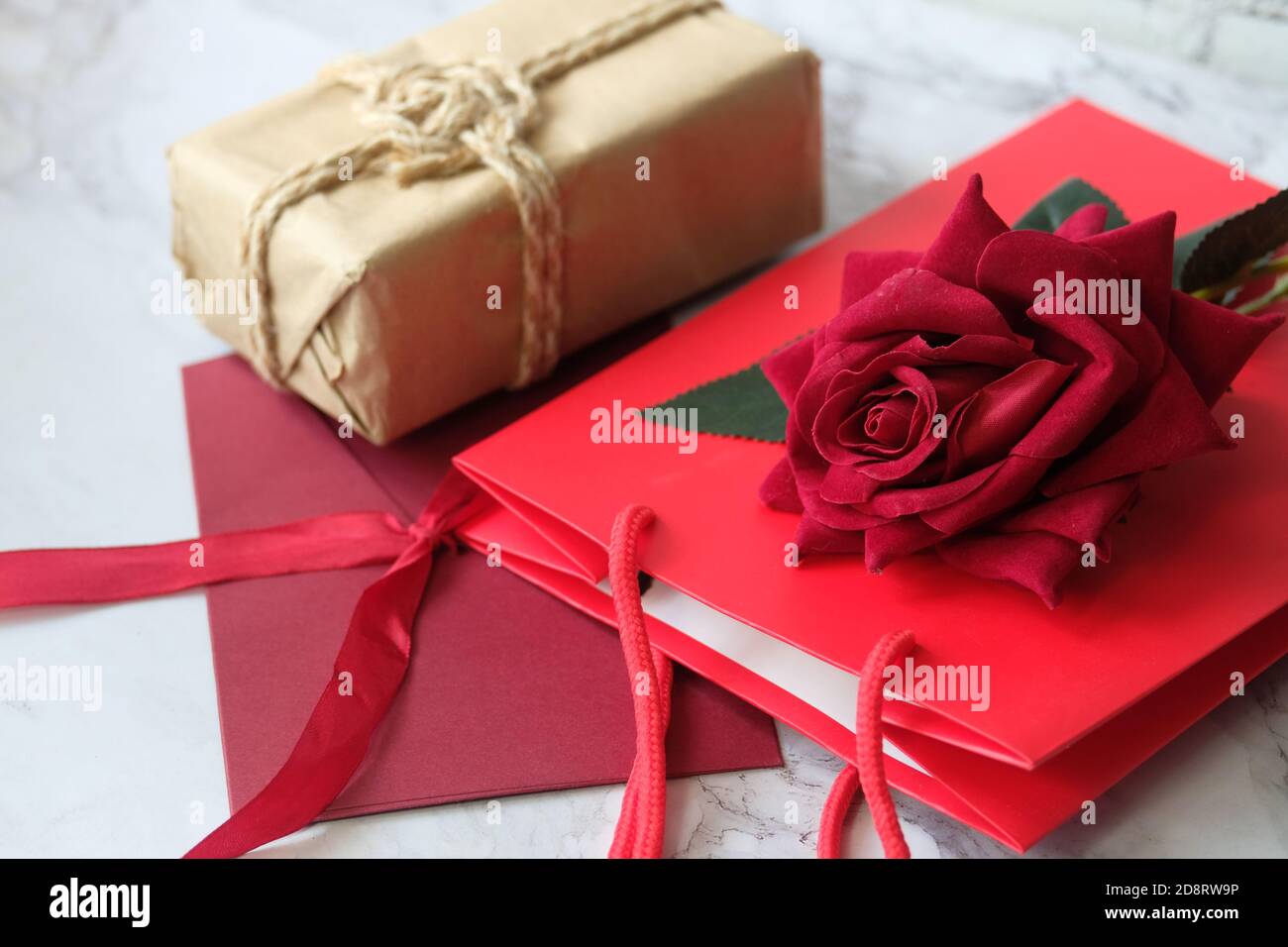 Envelope gift box rose flower hi-res stock photography and images - Alamy