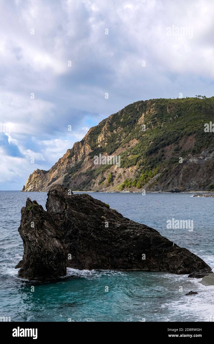 Rock Formation on a Pristine Pebble Beach with Beautiful Clear Blue ...