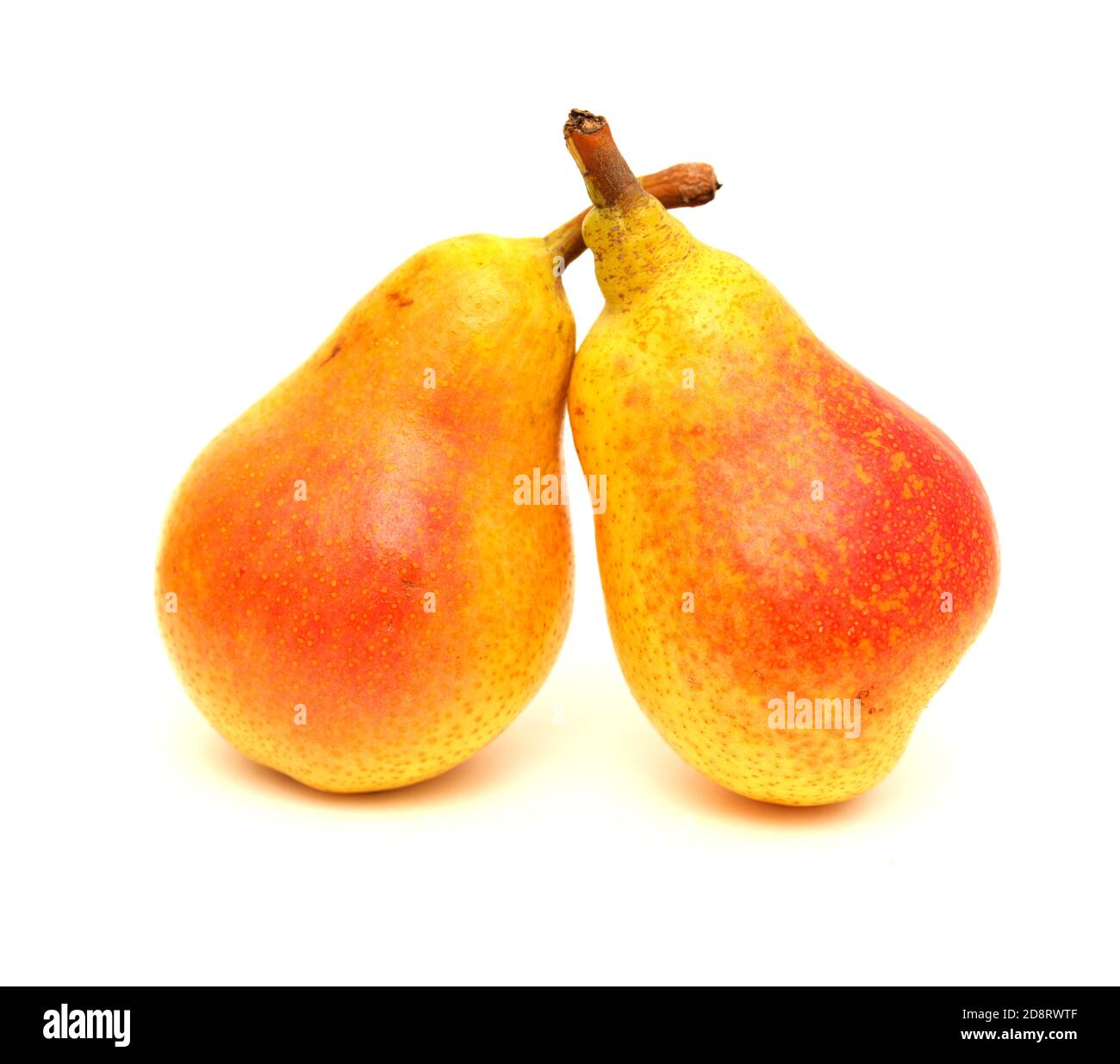 Small red and yellow pears isolated on white Stock Photo - Alamy