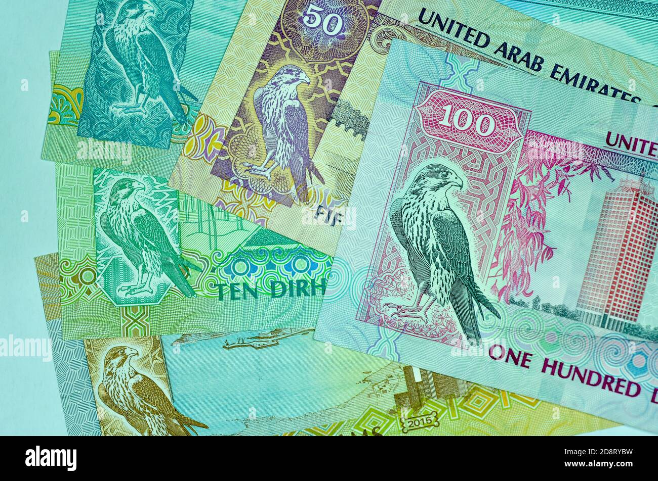 Top view shot of United Arab Emirates currency, dirhams isolated on a ...