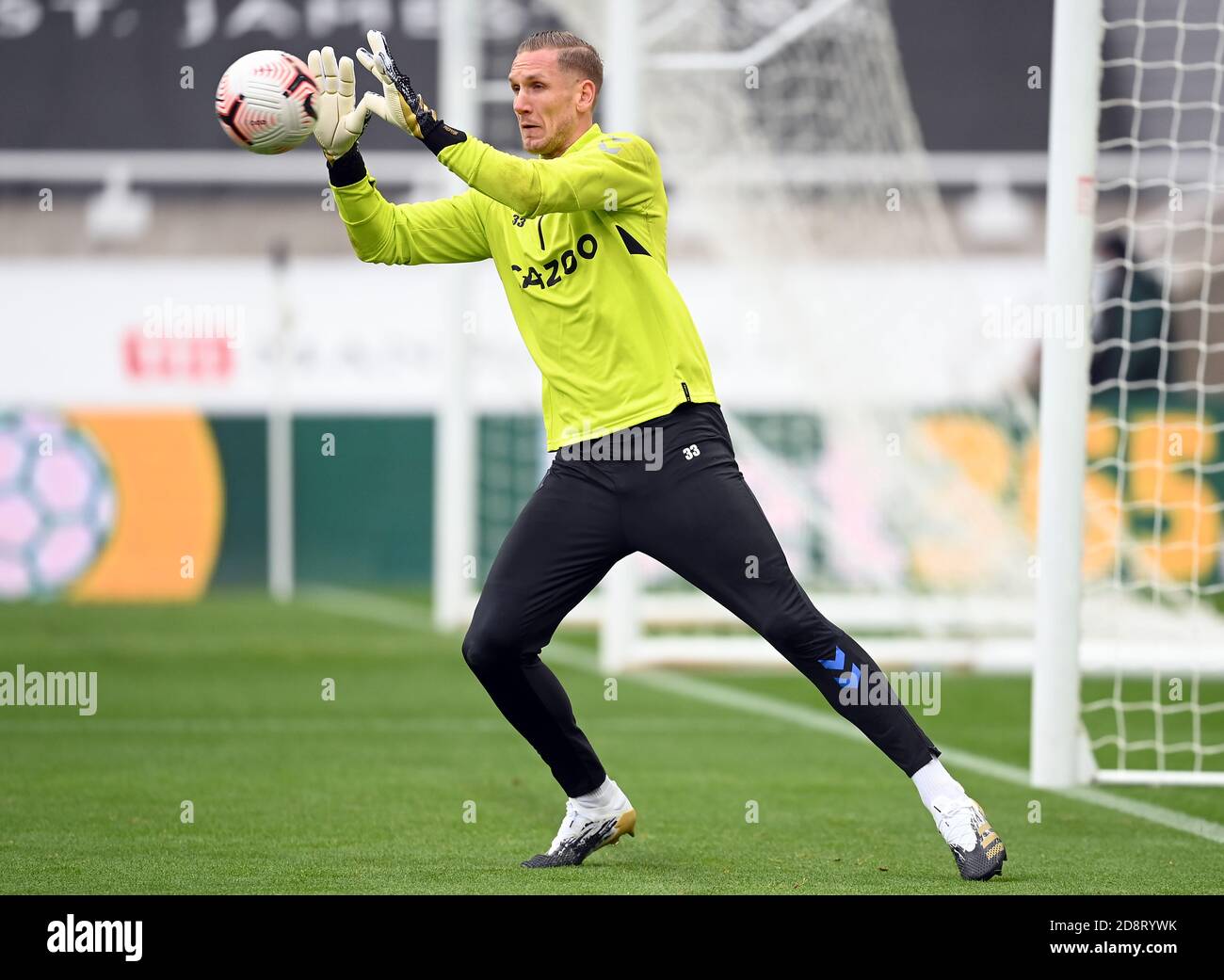 Everton goalkeeper Robin Olsen warms up before the Premier League match ...