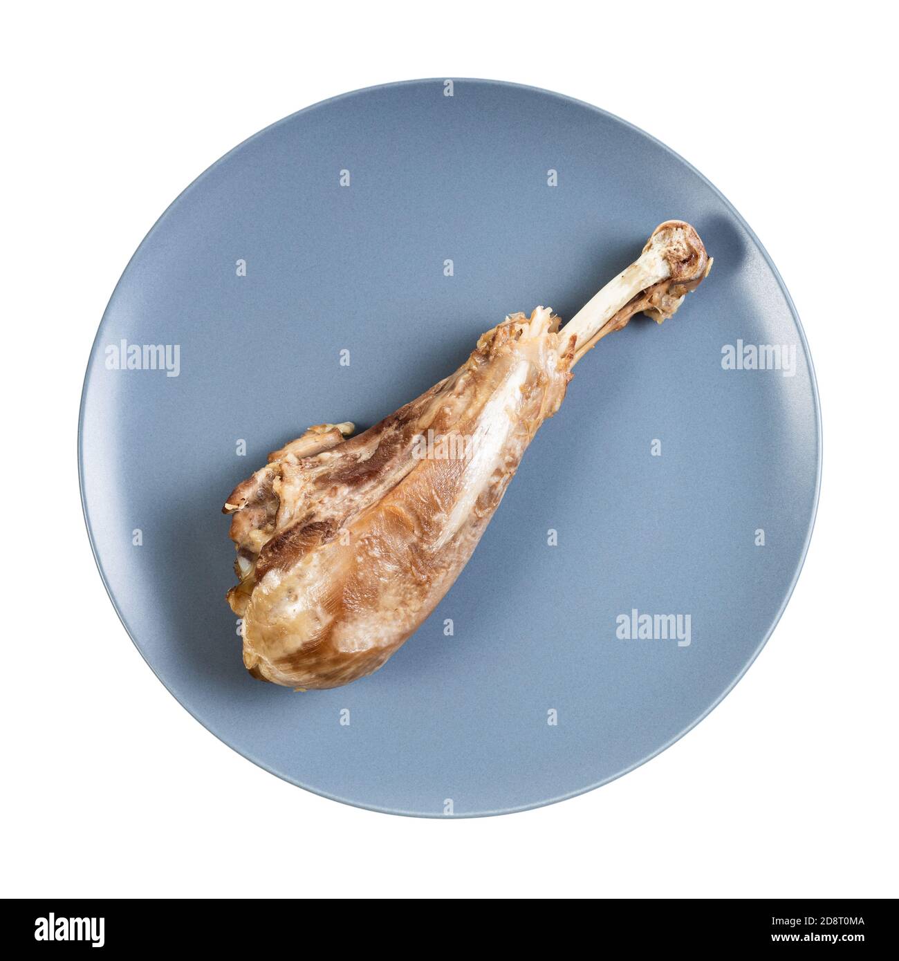 top view of single boiled turkey leg on blue plate isolated on white ...