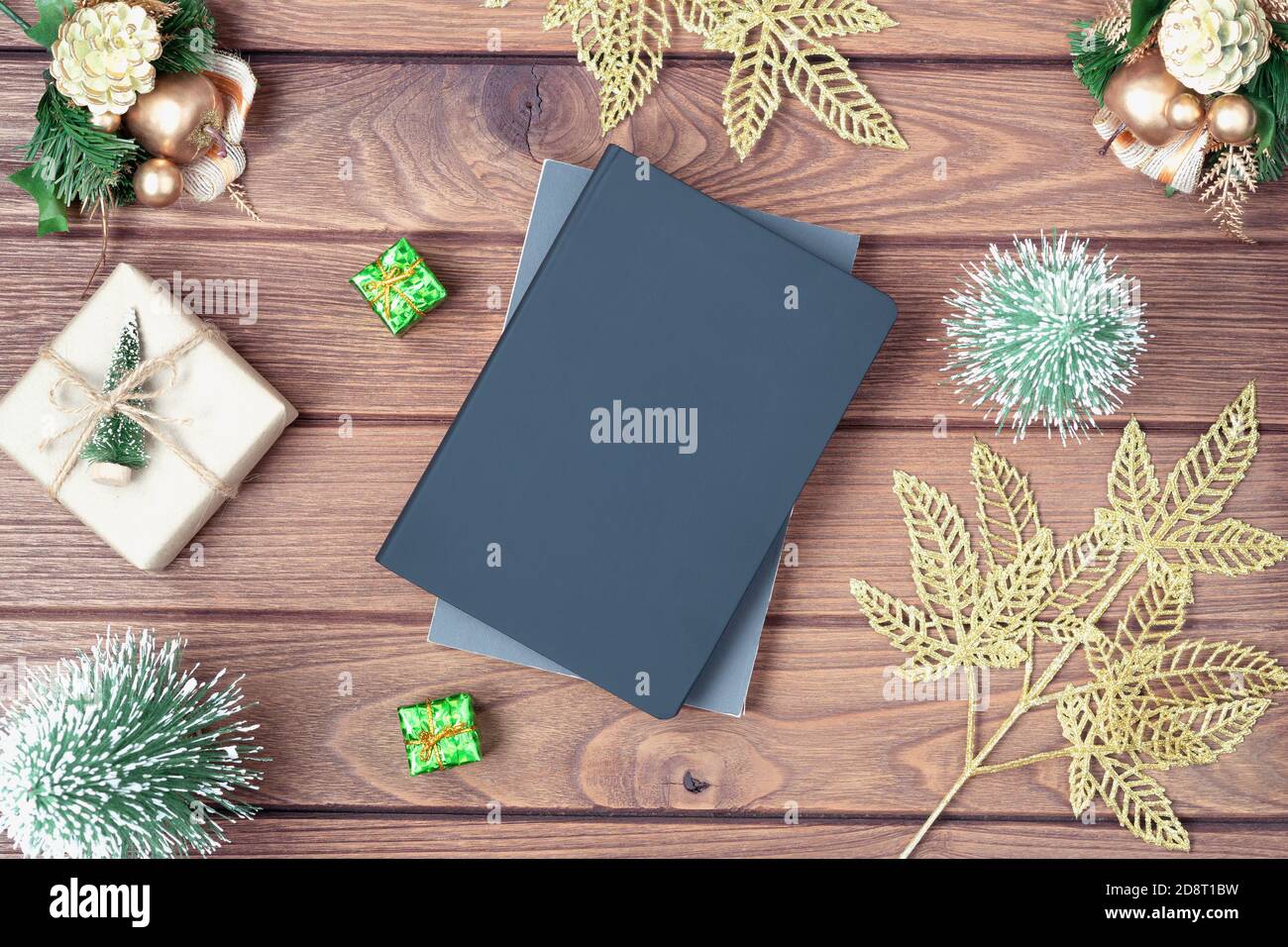 Mockup blank black book cover with Christmas gift box, Xmas ornaments ...