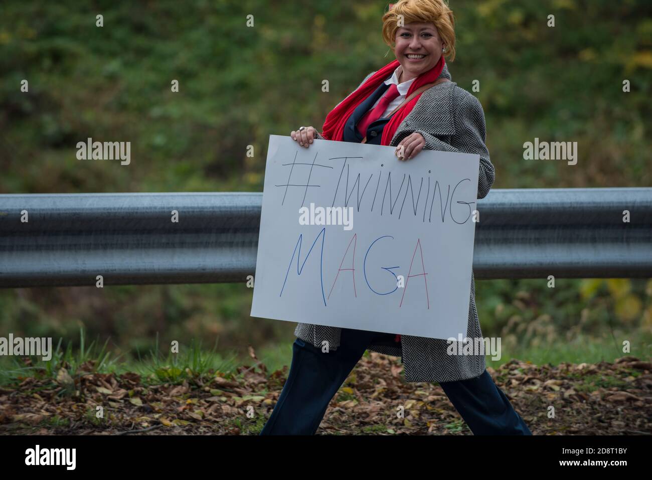 Woman with Trump sign walking to Trump Rally in Reading Pennsylvania ...