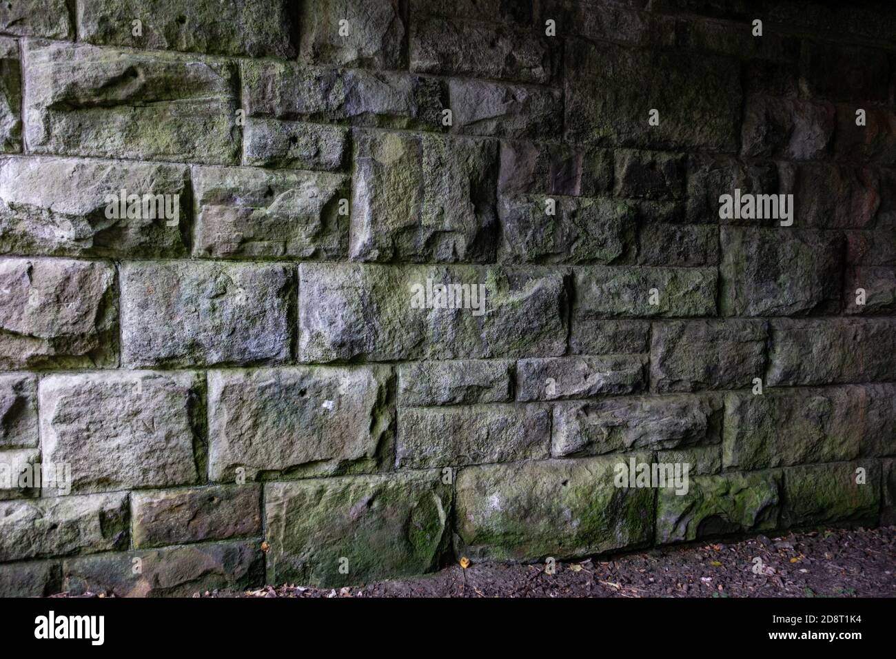 Heavy duty stone built bridge wall Stock Photo - Alamy