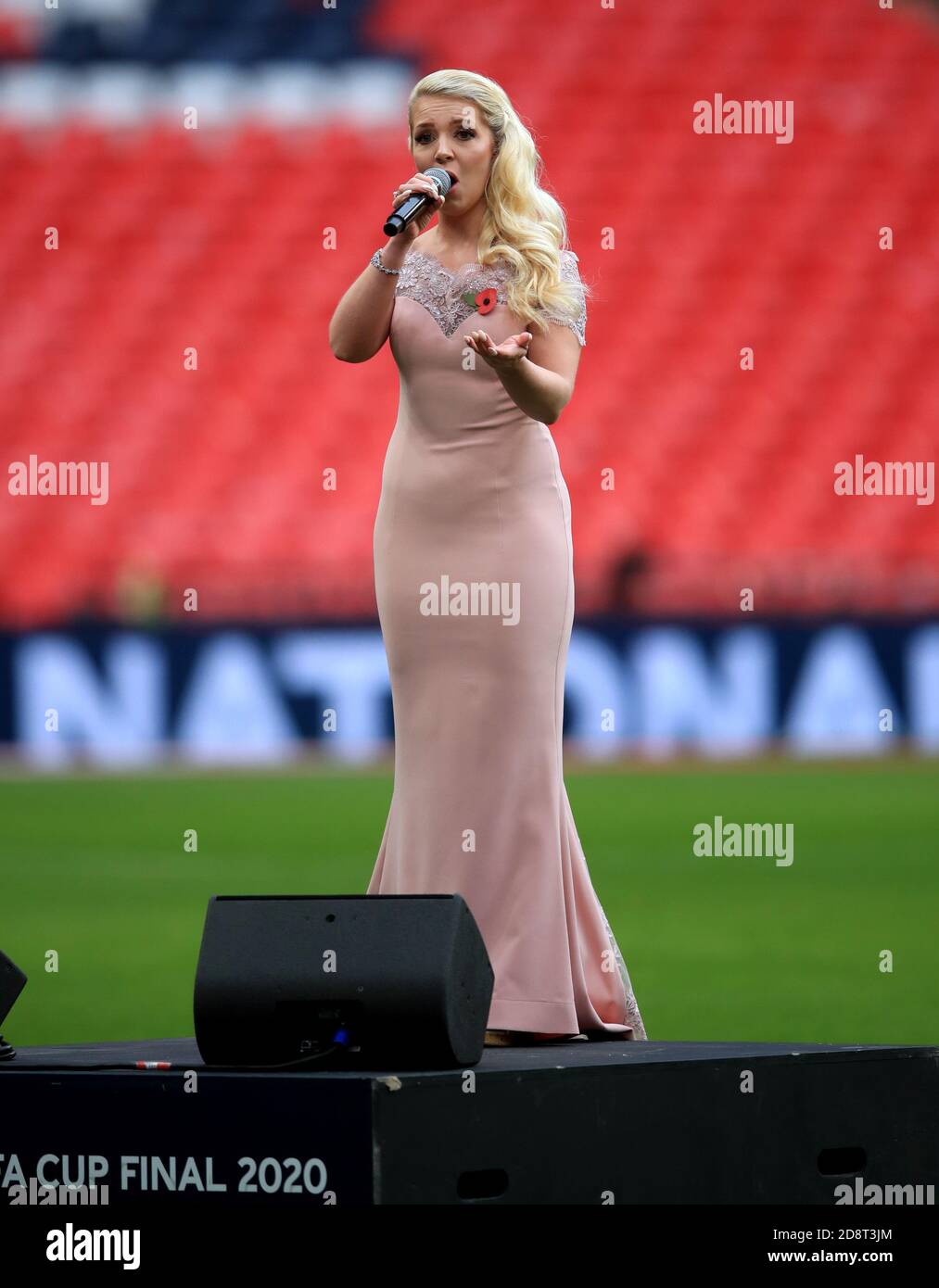 Emily Haig sings the national anthem prior to the beginning of the ...