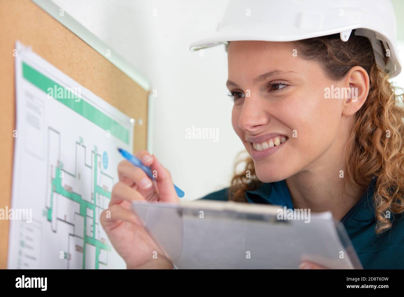 young building inspector checking construction structure Stock Photo ...