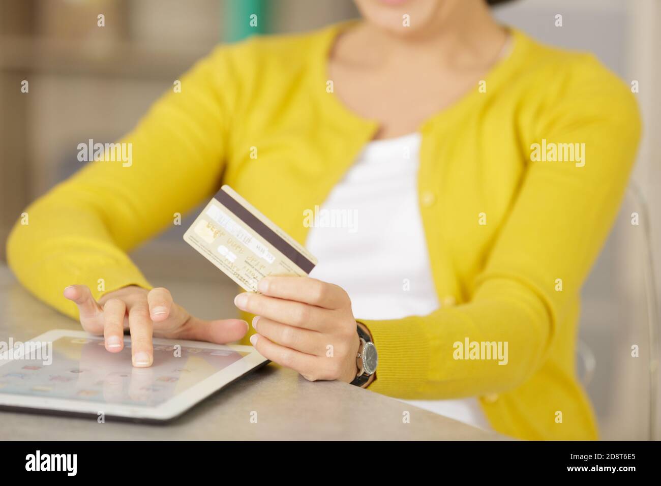 focused picture of woman using credit card for online shoping Stock ...