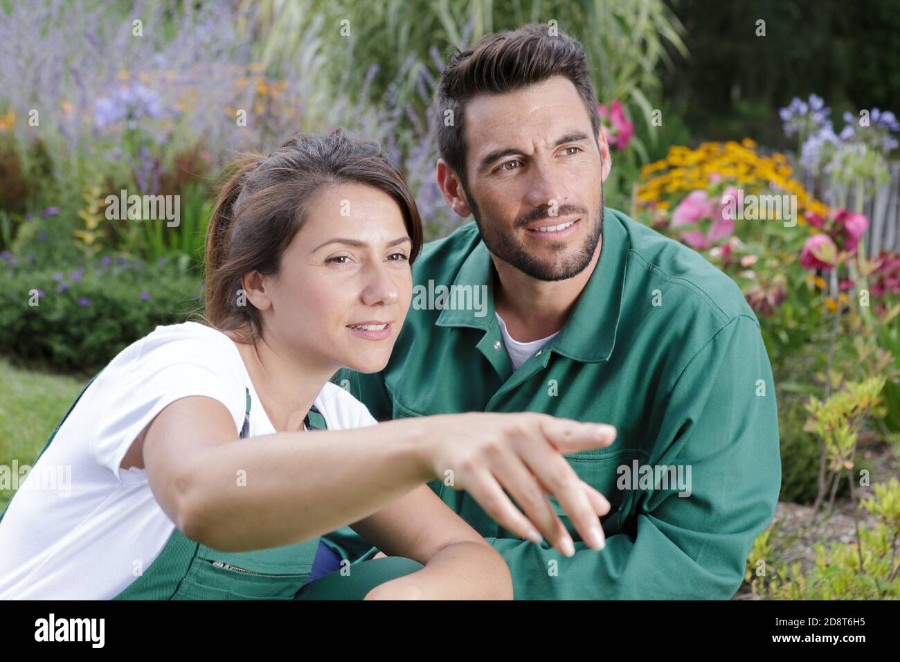 group of people gardening backyard together Stock Photo - Alamy