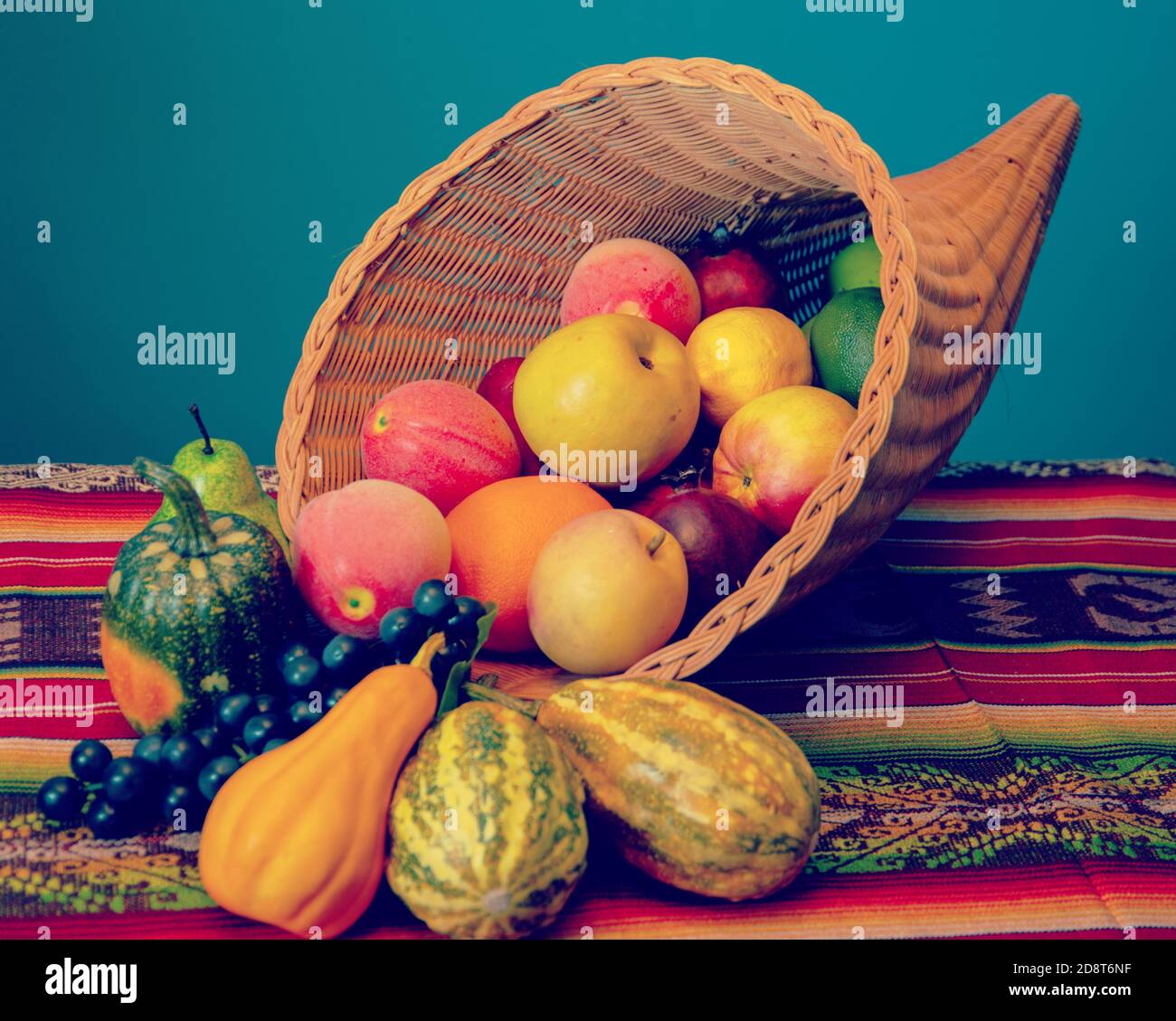 Fruit and Vegetables in wood Cornucopia on table Stock Photo - Alamy