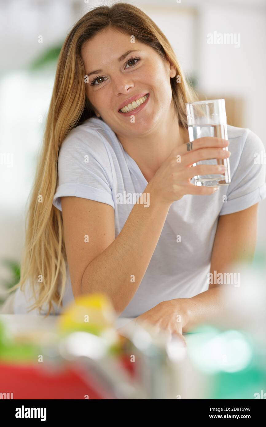 Woman drinking water in glass hi-res stock photography and images - Alamy