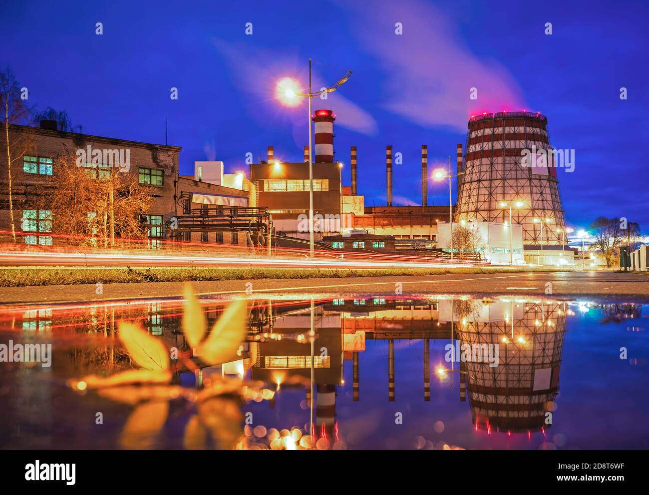 A panoramic view of the pipes and cooling towers of the CHP. Industry ...