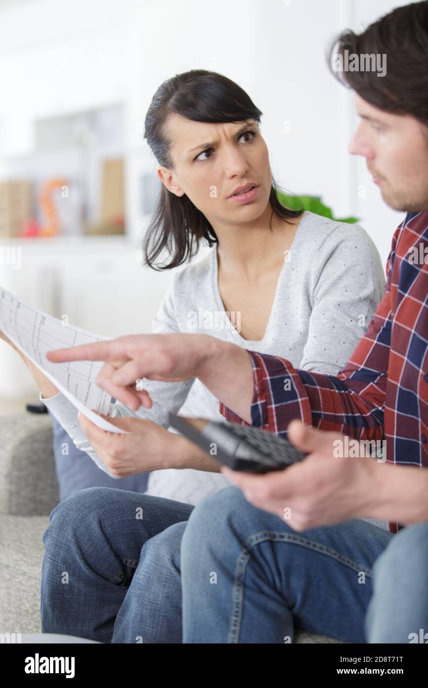 couple getting into an argument while doing their accounts Stock Photo ...