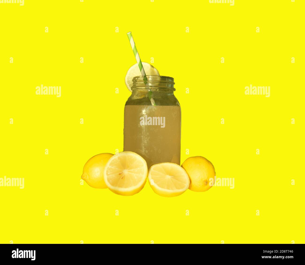 Drink in Mason jar with lemons, with overlay yellow background Stock ...
