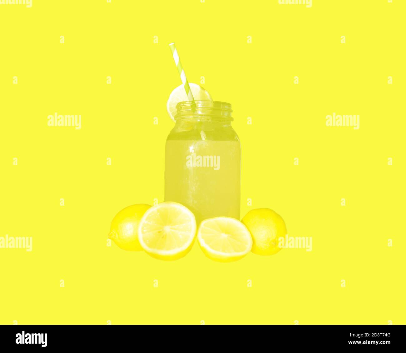 Drink in Mason jar with lemons, with overlay yellow background Stock ...