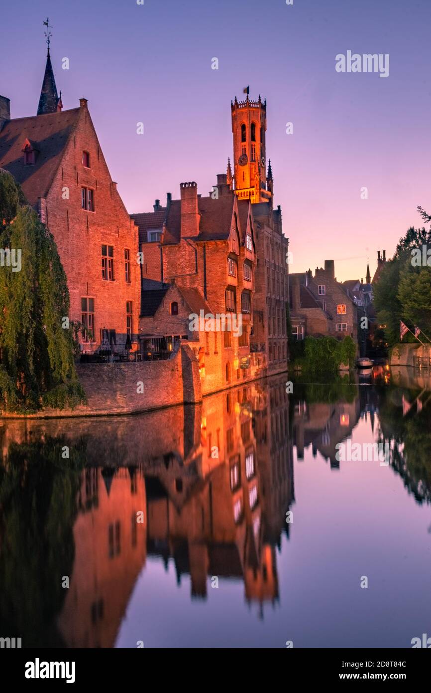BRUGES, BELGIUM, 21 JULY 2020: Sunset over the canal in the historic ...