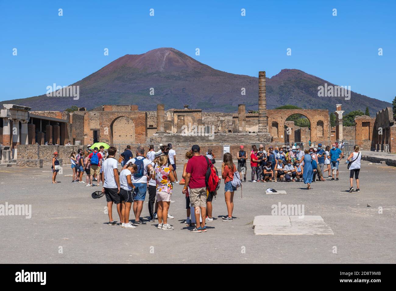 Forum in ancient city of Pompeii in Italy with Mount Vesuvius in the ...