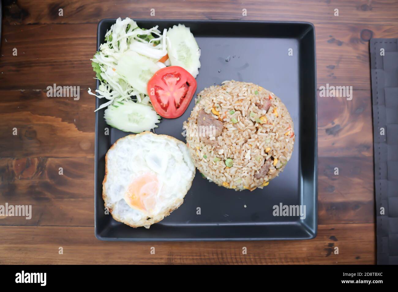 stir fried rice or fried rice with egg and vegetable Stock Photo - Alamy