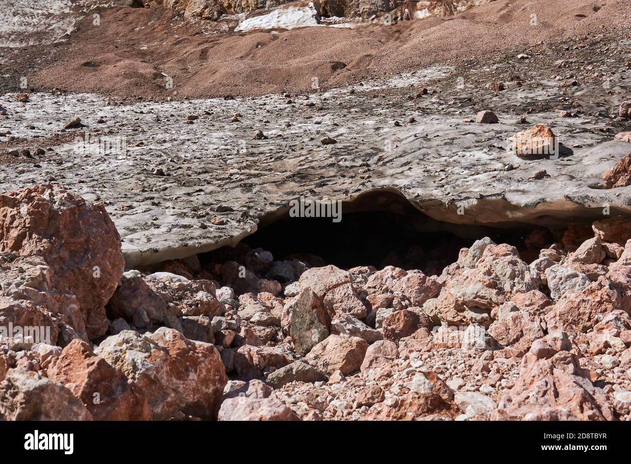 glacial cave formed under a retreating glacier in the Caucasus Stock ...